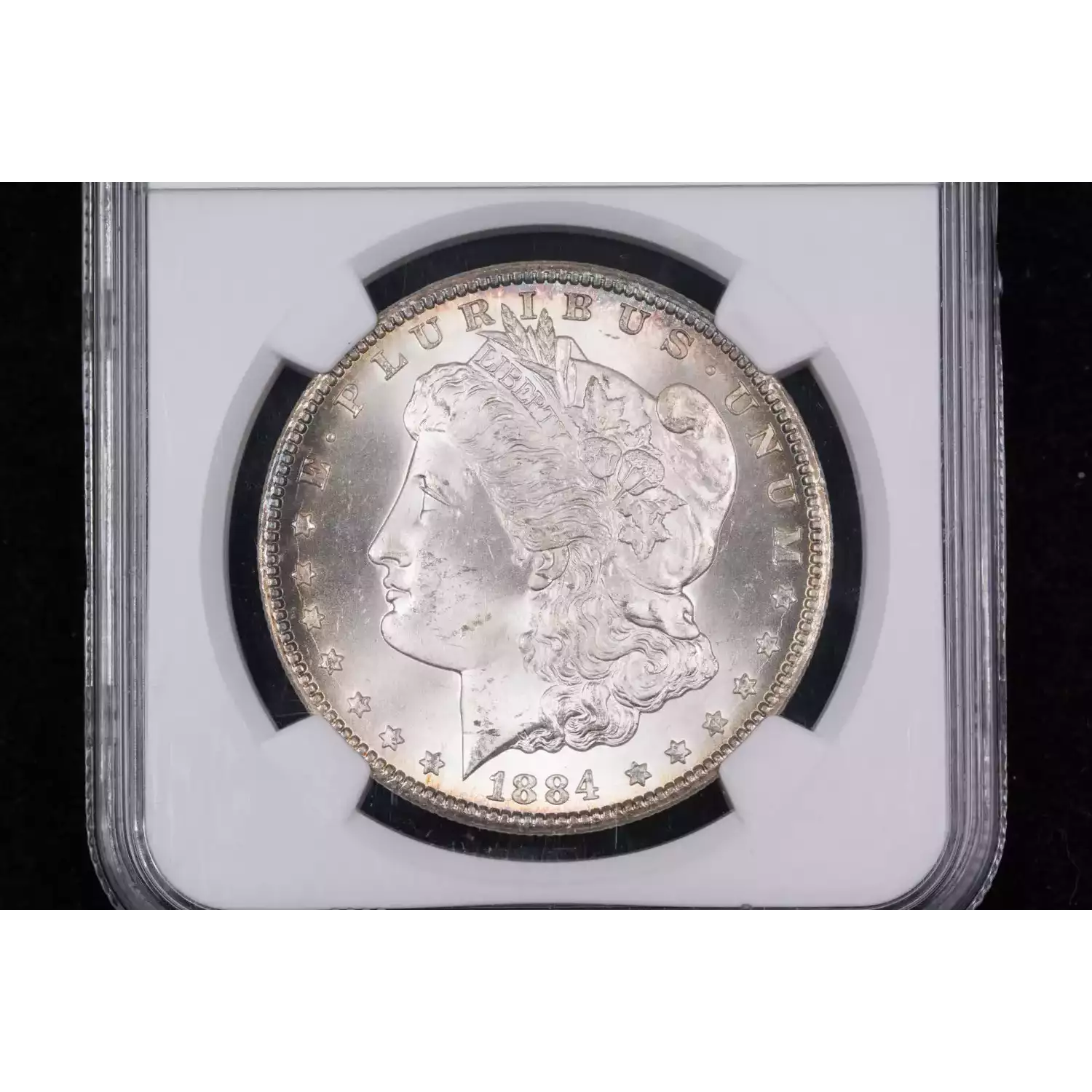 1884-CC Morgan Silver Dollar NGC MS-63 - Hertel's Coins Inc.
