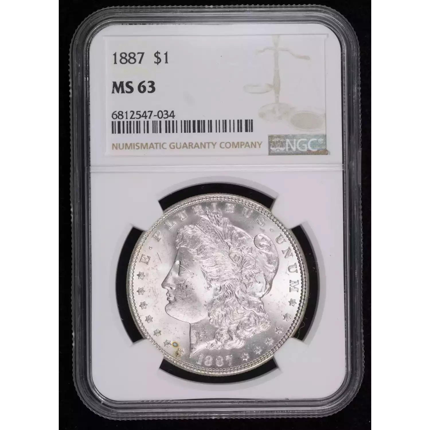 1887 Morgan Silver Dollar NGC MS-63 - Hertel's Coins Inc.