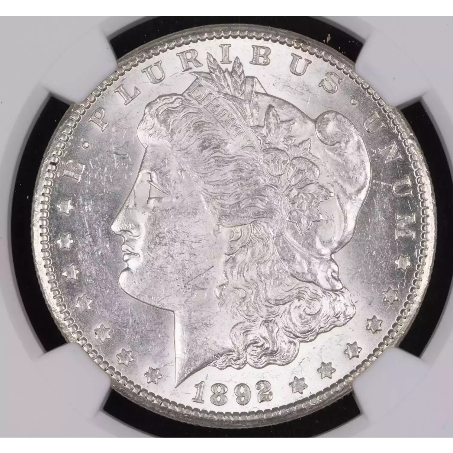 1892-CC Morgan Silver Dollar NGC AU-58 - Hertel's Coins Inc.